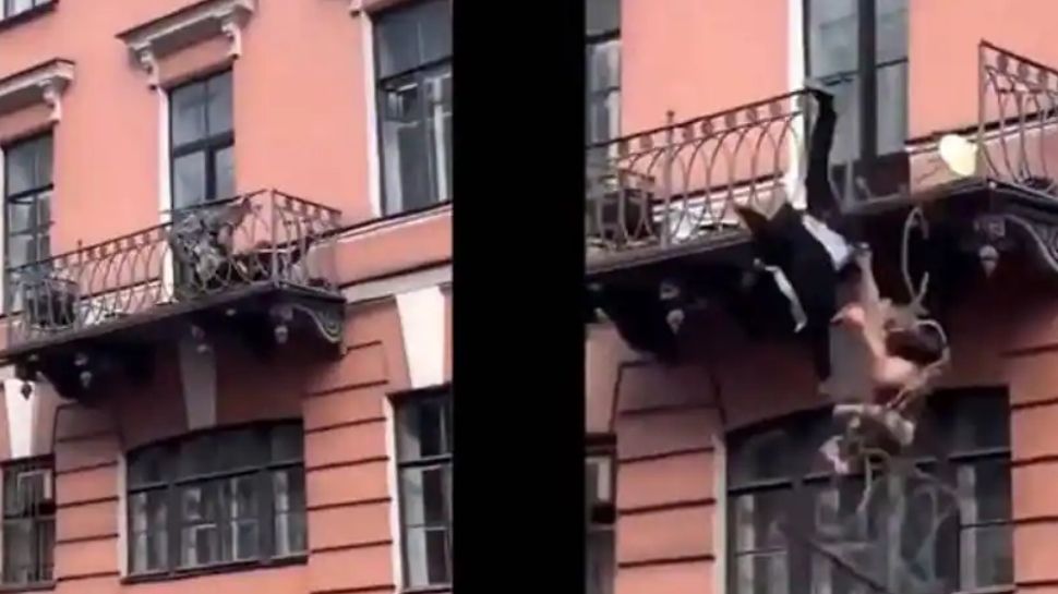 shocking Viral video Couple arguing on balcony fall 25-feet below on ...
