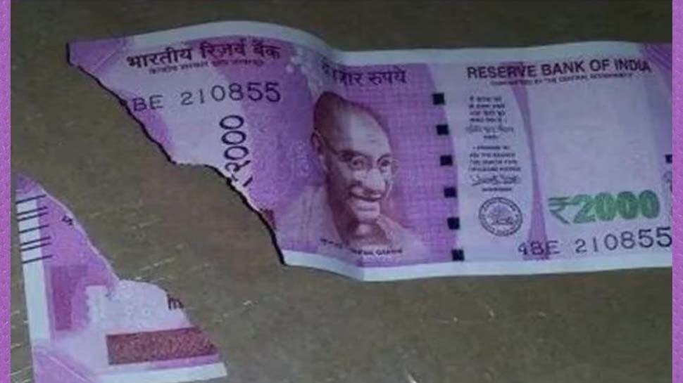 Mutilated 2000 rupee note exchange if you have a teared note in this condition you will get less ...